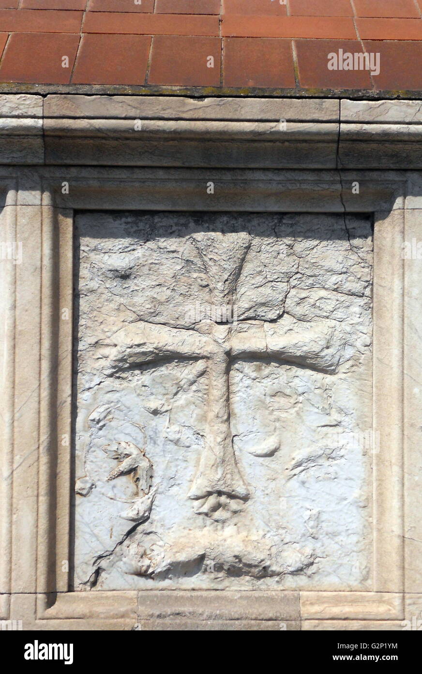 External detail from a church in Florence, Italy. Stonework reliefs ...