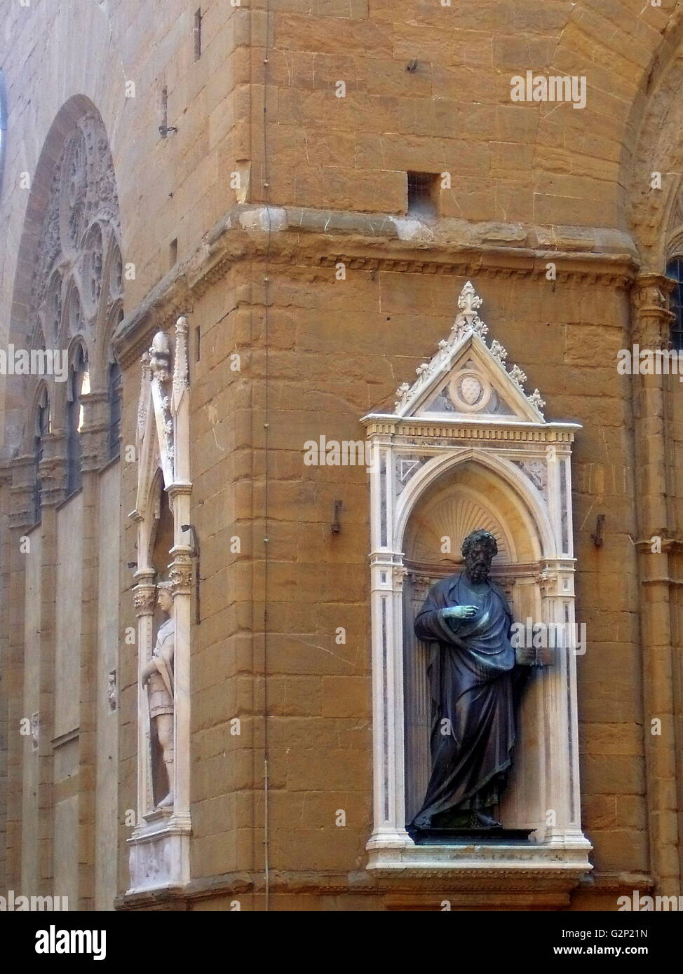 Statue detail on out outside of a church in Florence, Italy. Semi ...