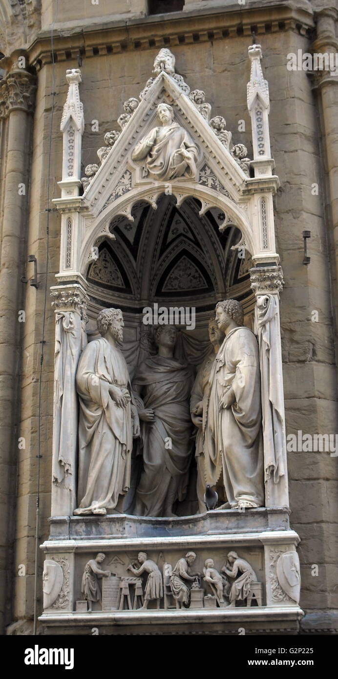 Statue detail on the outside of a church in Florence, Italy. Semi ...