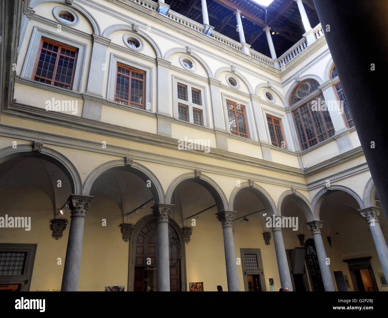 Palazzo Strozzi in Florence, Italy. A symmetrical palace which began ...
