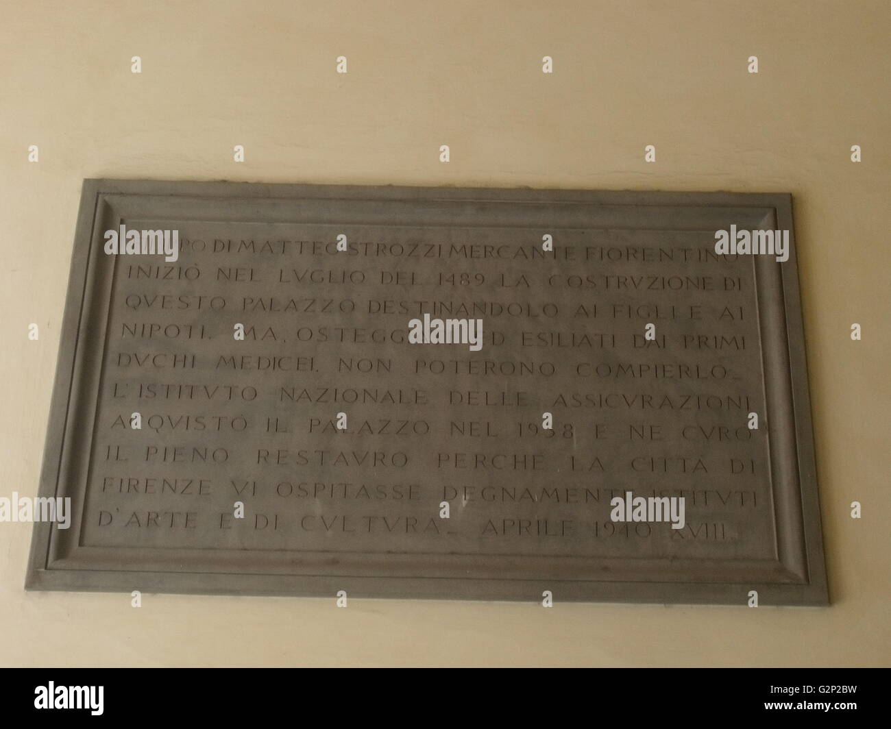 Latin inscription detail from the Palazzo Strozzi in Florence, Italy. A ...