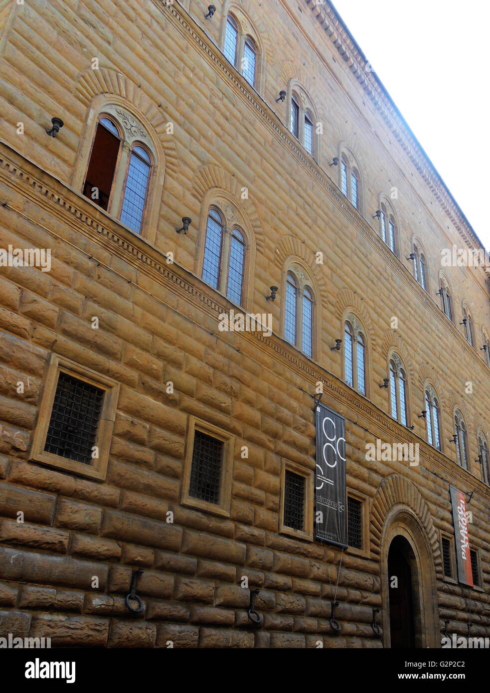 Palazzo Strozzi in Florence, Italy. A symmetrical palace which began ...