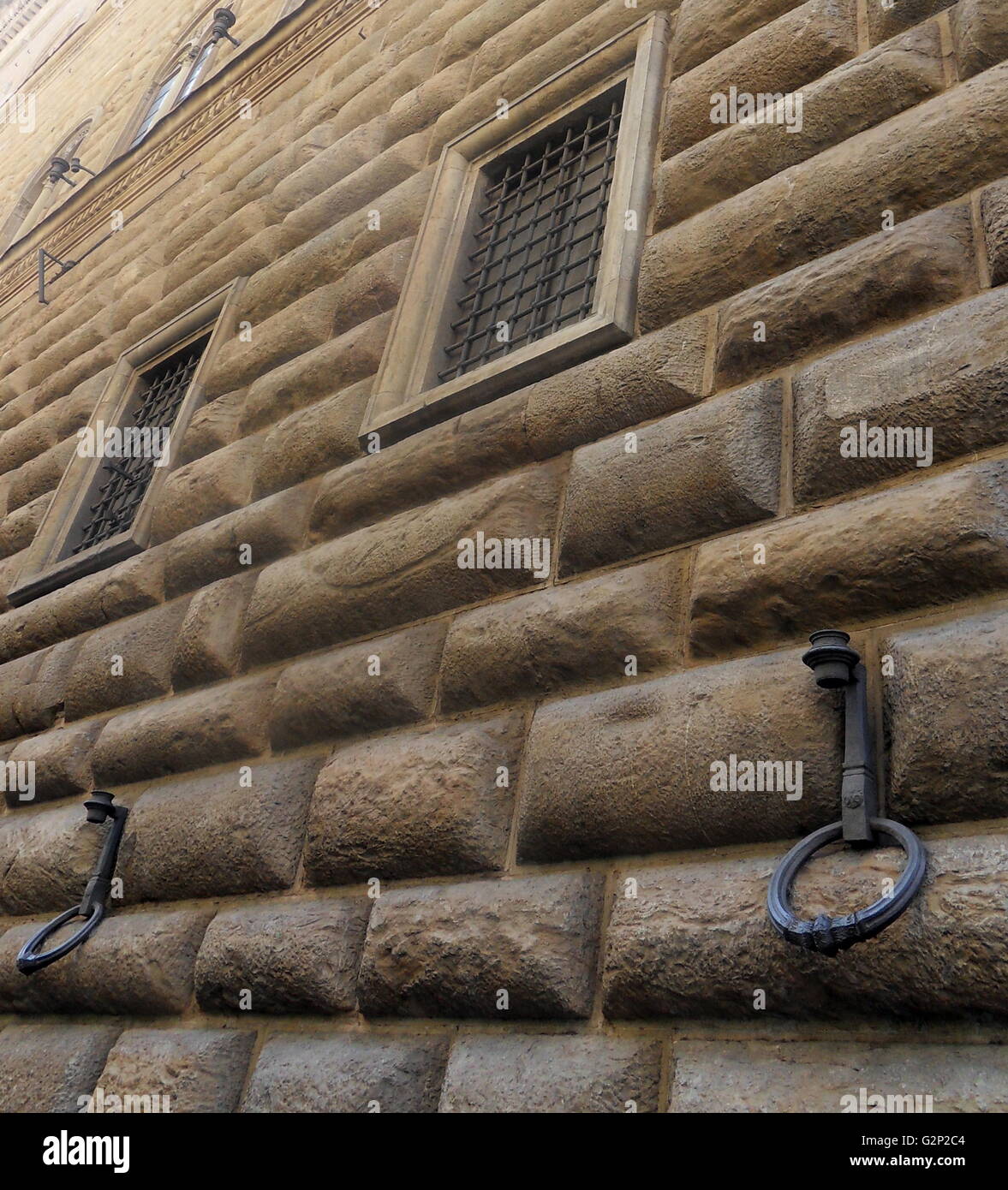 Details from the Palazzo Strozzi in Florence, Italy. A symmetrical ...