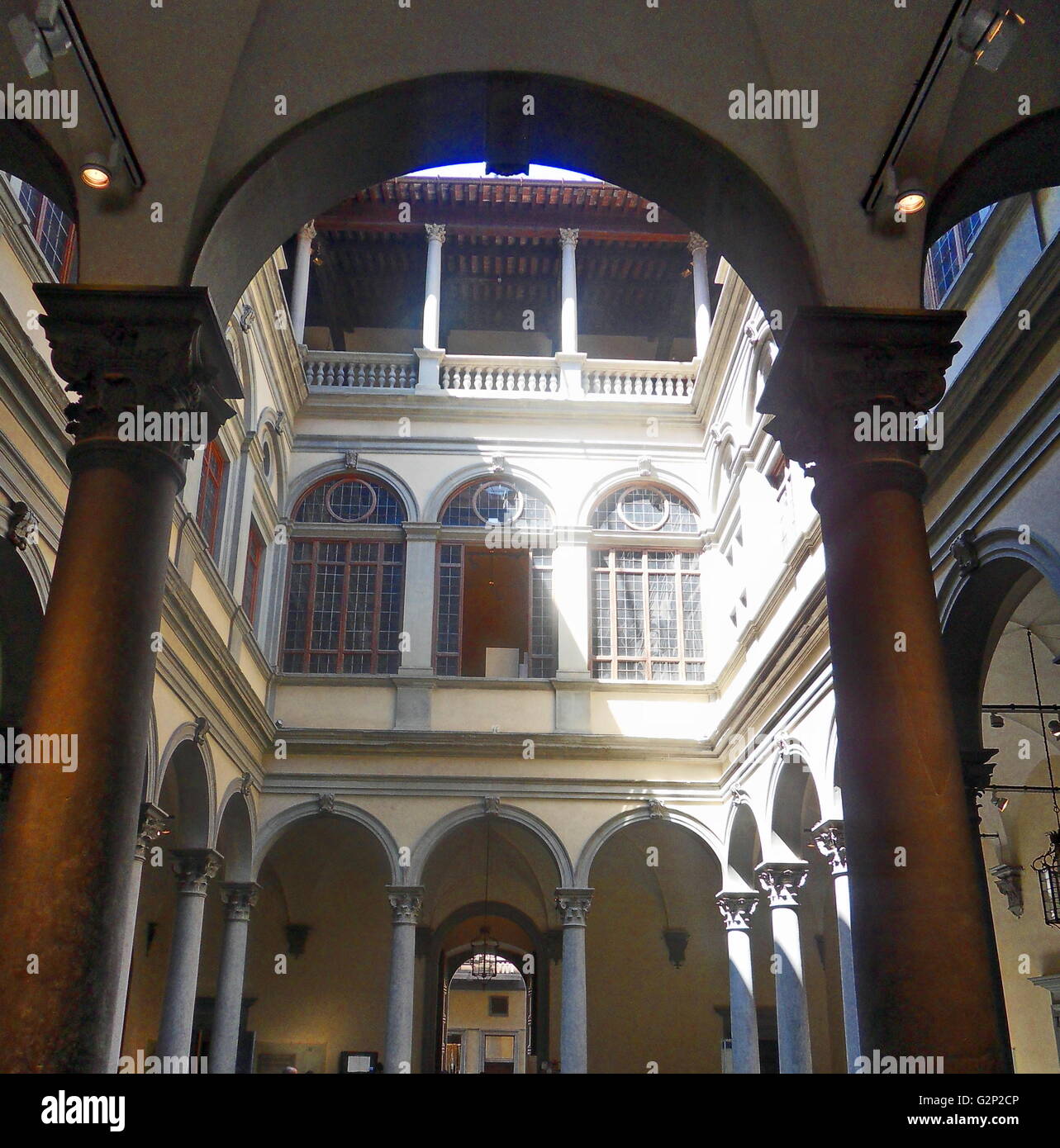 Palazzo Strozzi in Florence, Italy. A symmetrical palace which began ...