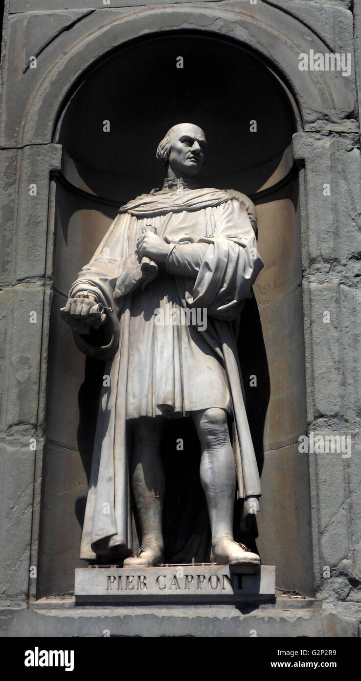 Statue located outside of the Uffizi museum in Florence, Italy. One of ...