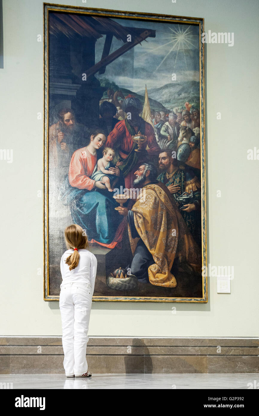 Little girl looking at Juan del Castillo's painting depicting the ...