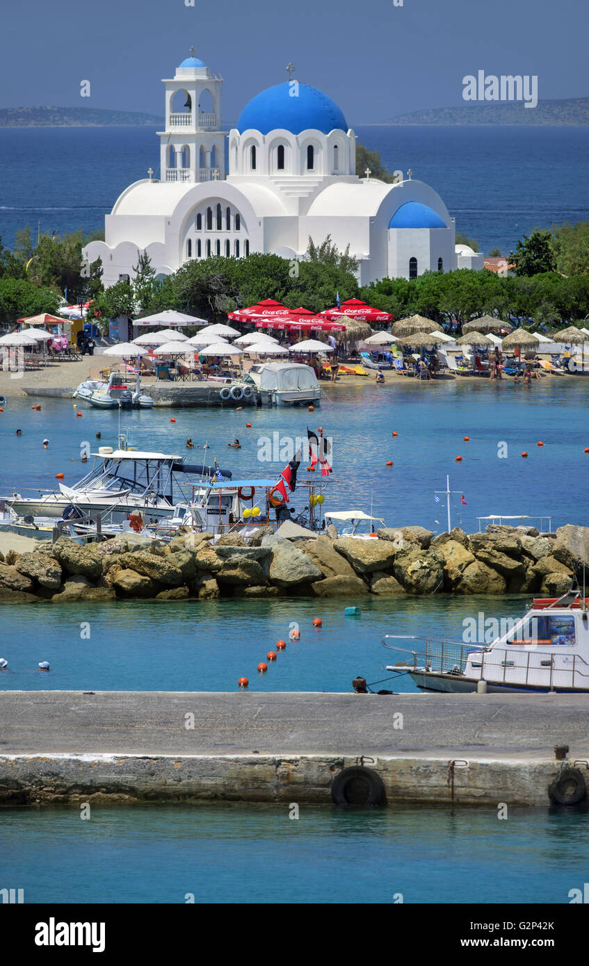 close view to Agioi Anargiroi church at Skala's port in Agistri island ...