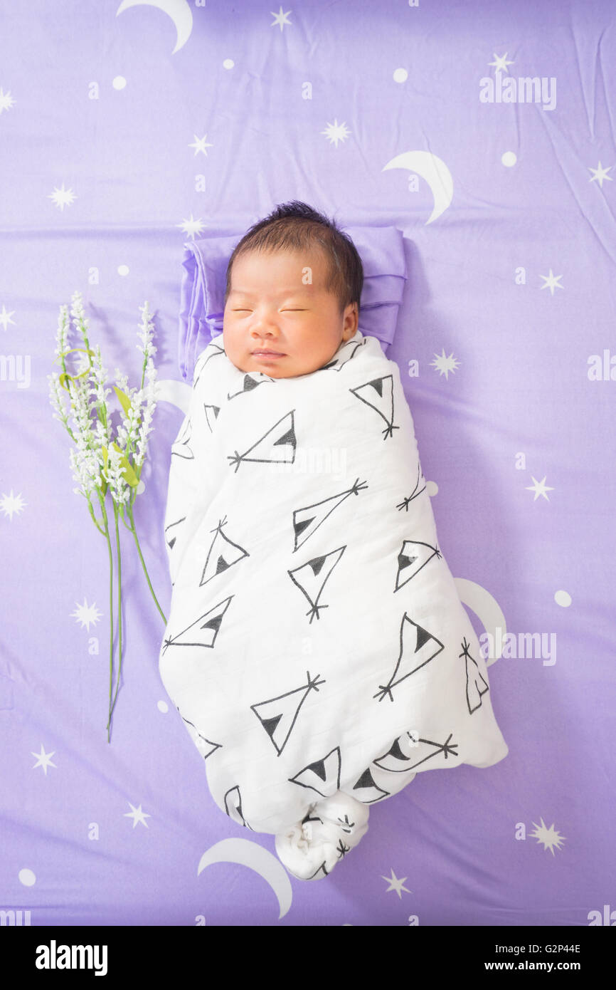 Cute newborn asian girl sleeping Stock Photo - Alamy