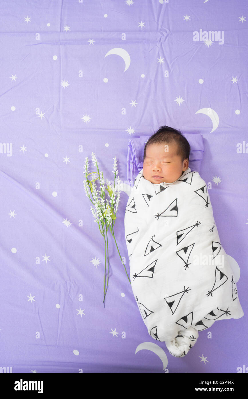 Cute newborn asian girl sleeping Stock Photo - Alamy