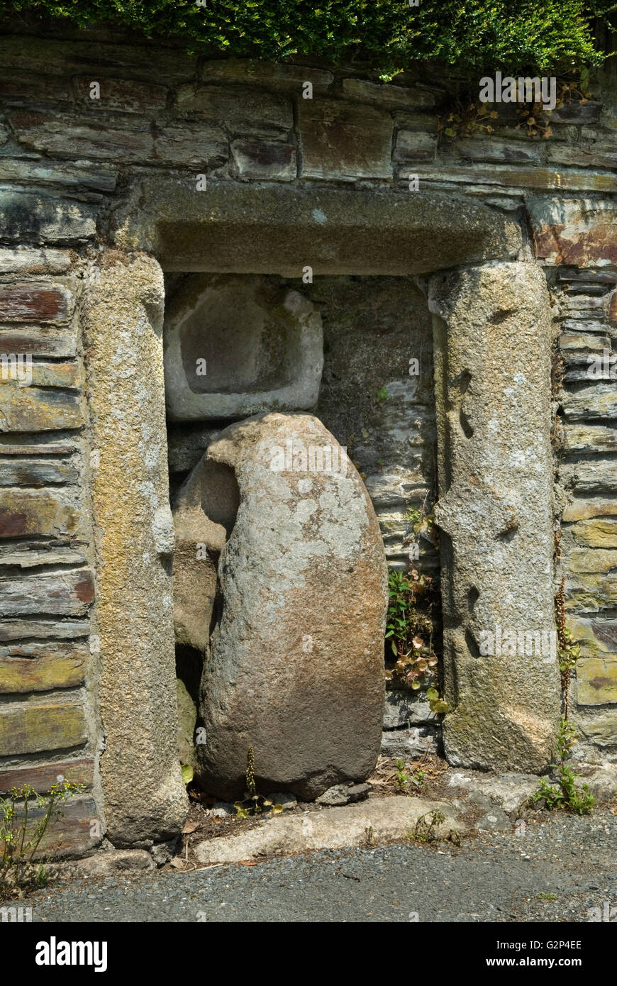 A trough above a large possibly a pestle used to crush ore now ...