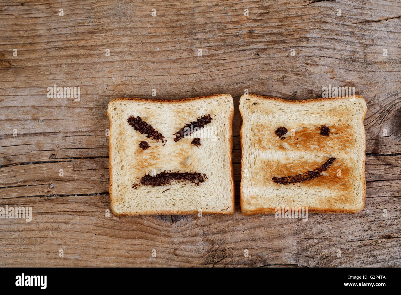 Toast Bread with happy and angry face painted with hazelnut chocolate ...