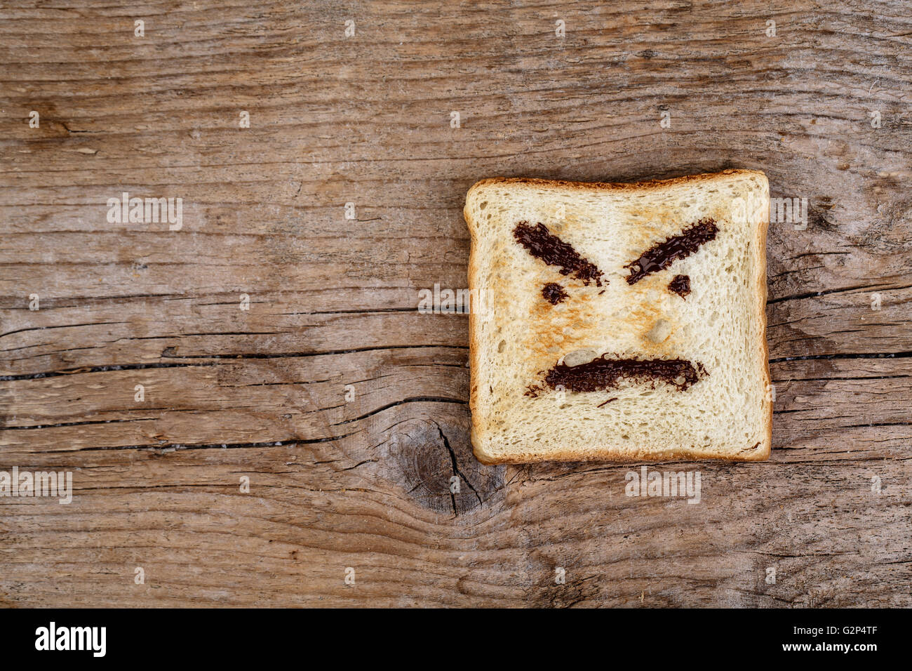 Toast Bread with angry face painted with hazelnut chocolate spread ...