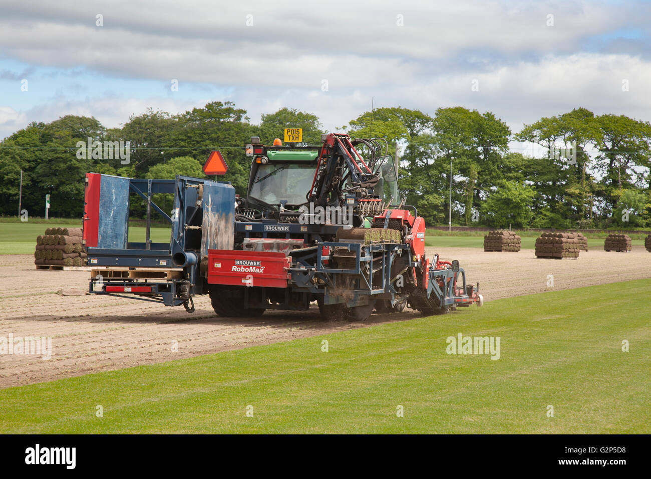 Brouwer RoboMax Automatic Roll Sod Harvester harvesting turf in ...