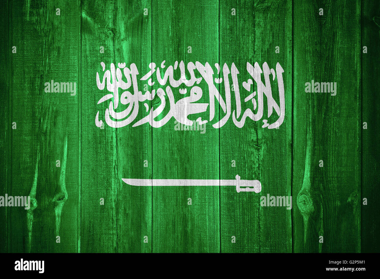flag of Saudi Arabia or Saudi Arabian banner on wooden background Stock ...