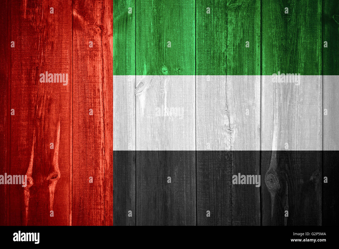 flag of United Arab Emirates or Emirati banner on wooden background ...