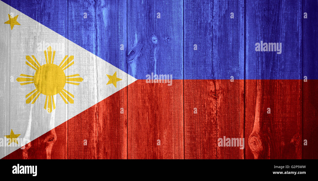 flag of Philippines or Filipino banner on wooden background Stock Photo ...