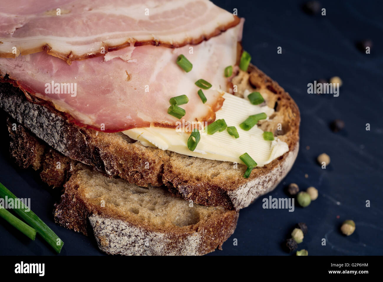 Slices of Bread with Ham, Butter and Chives Stock Photo - Alamy
