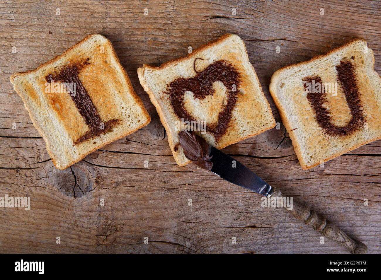 I Love You painted with hazelnut cream on white toast bread Stock Photo ...