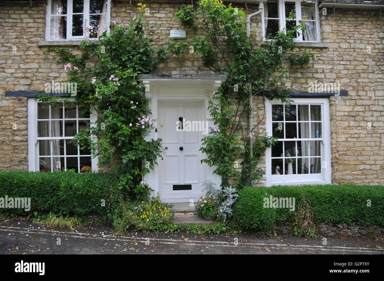 period house front with classic white door and black furniture Stock ...
