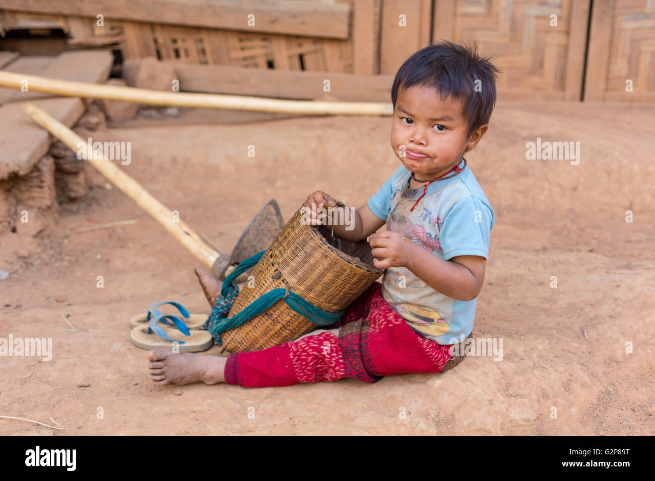 Burmese child playing in a village near Mandalay, Myanmar, Burma, South ...