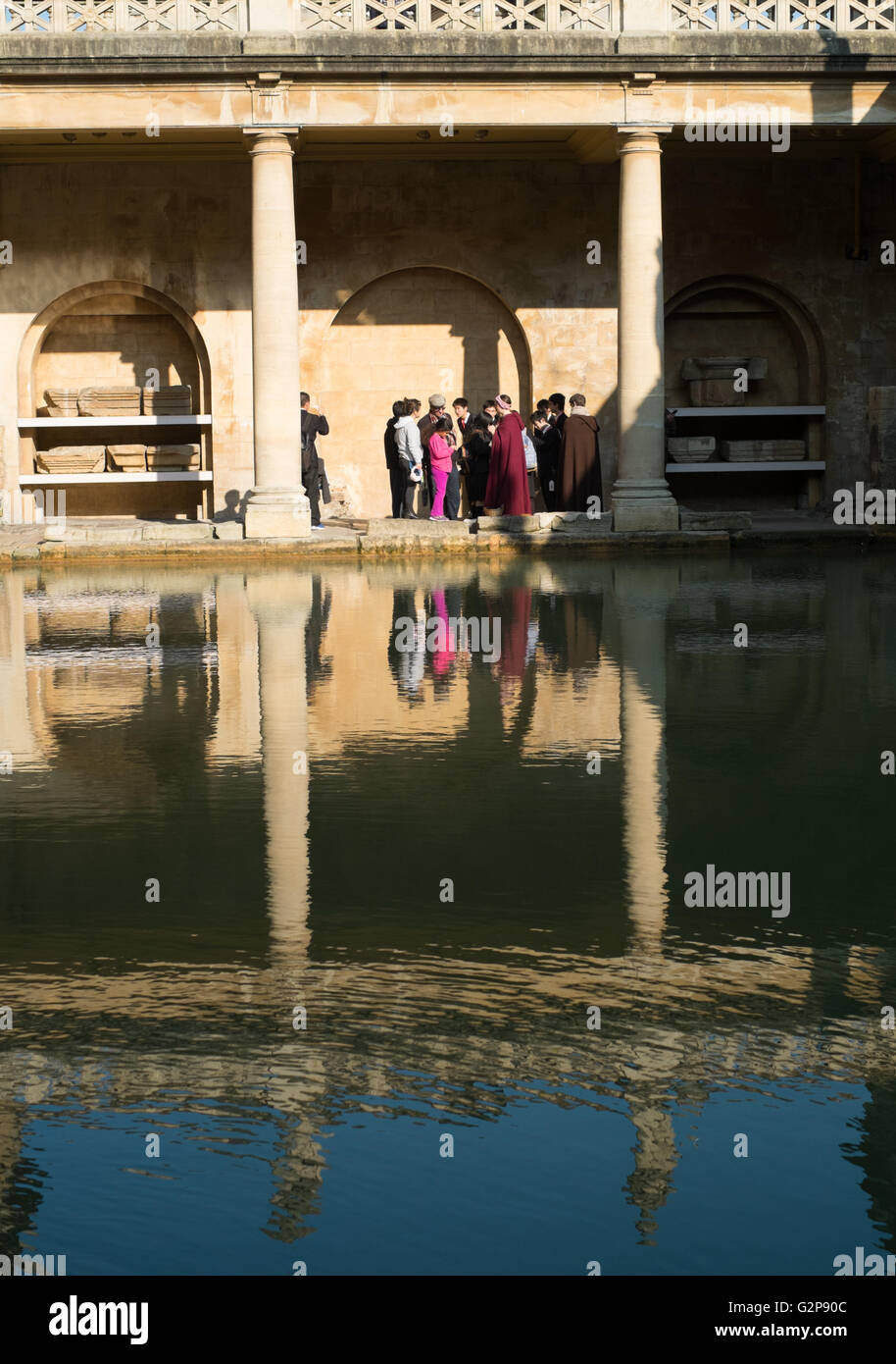 Visitors at the Roman thermal baths at Bath in Somerset,England Stock ...