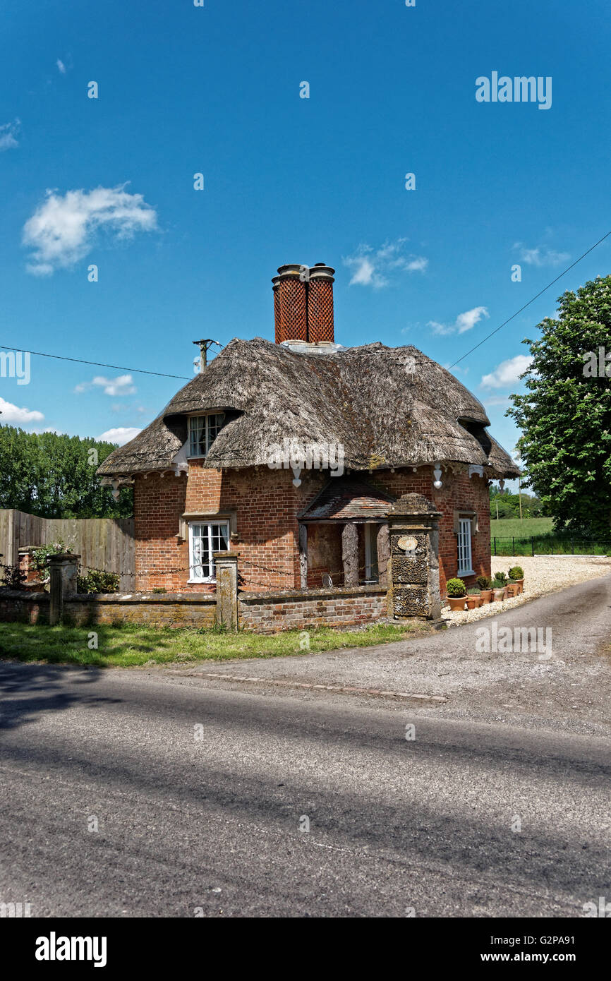 Rustic brick house thatched roof hi-res stock photography and images ...