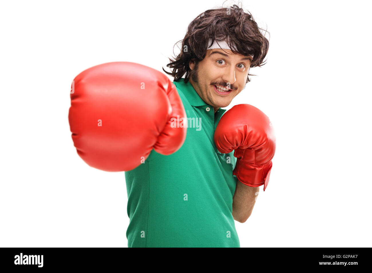 Retro looking guy with red boxing gloves throwing a punch towards the ...
