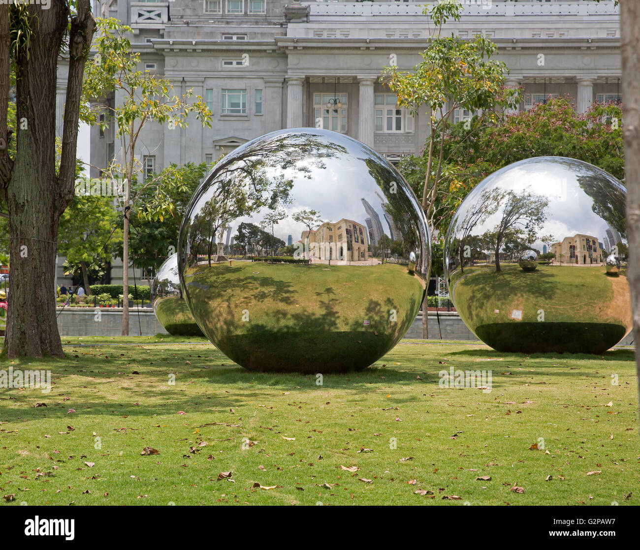 Large Spherical reflective balls on the grass in Singapore Stock Photo ...