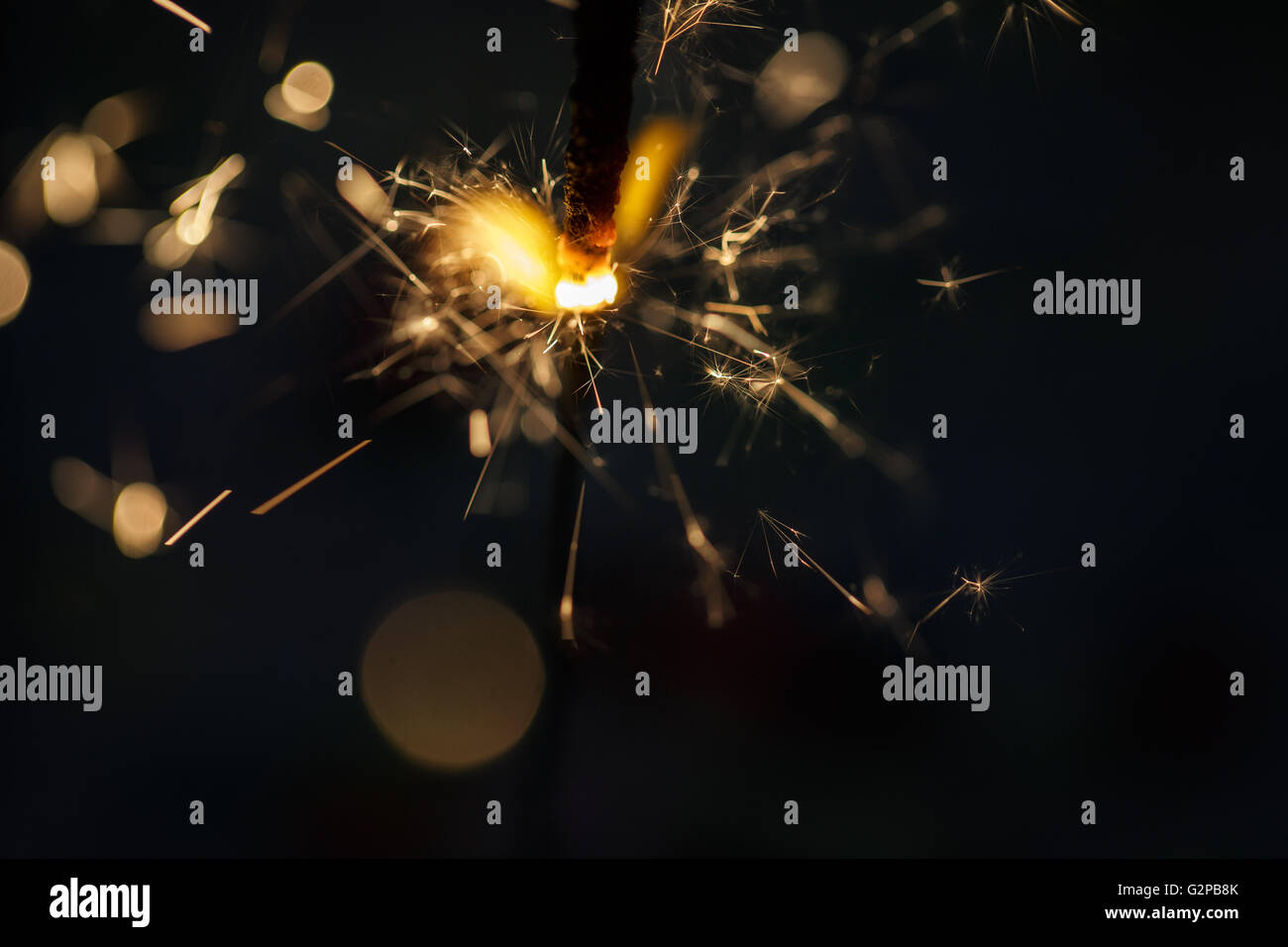 Burning Sparklers with colorful Confetti on wooden Table at a Party ...