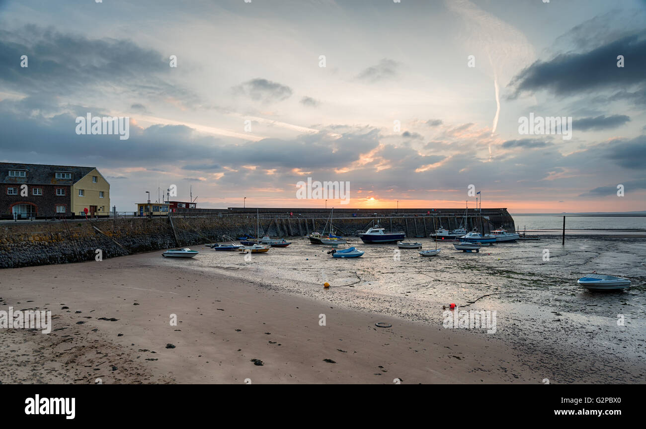 Sunrise over the old harbour at Minehead on the Somerset coast Stock ...