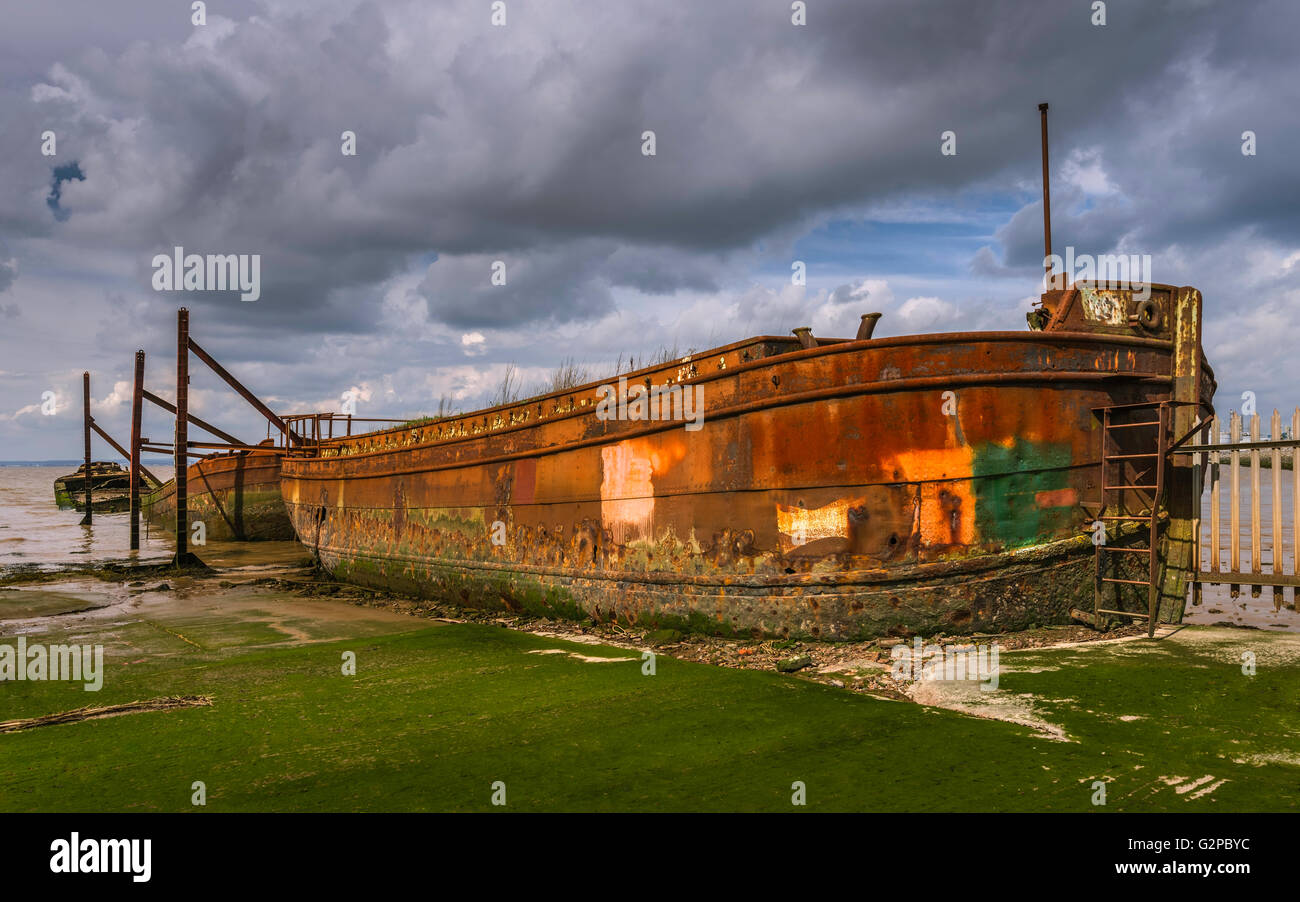 Disused ship yard with derelict, obsolete, and rusting iron ships ...