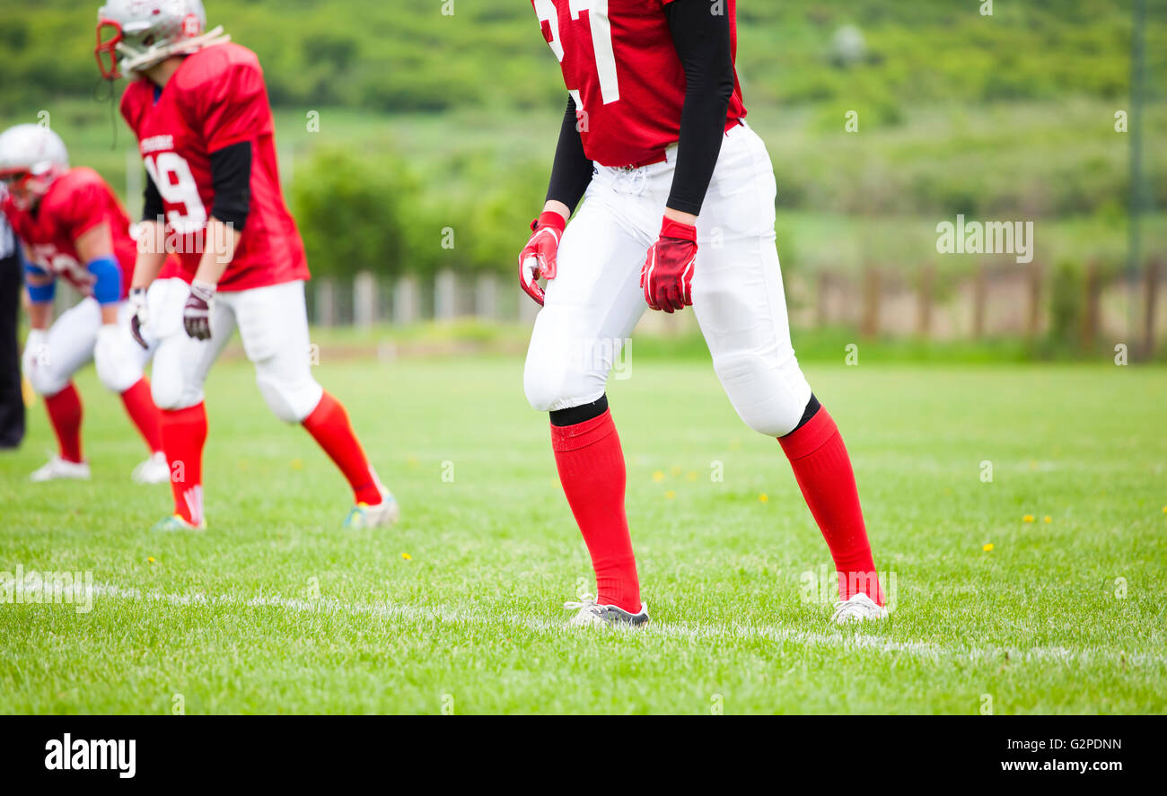 American football team on the field prepared for action Stock Photo - Alamy