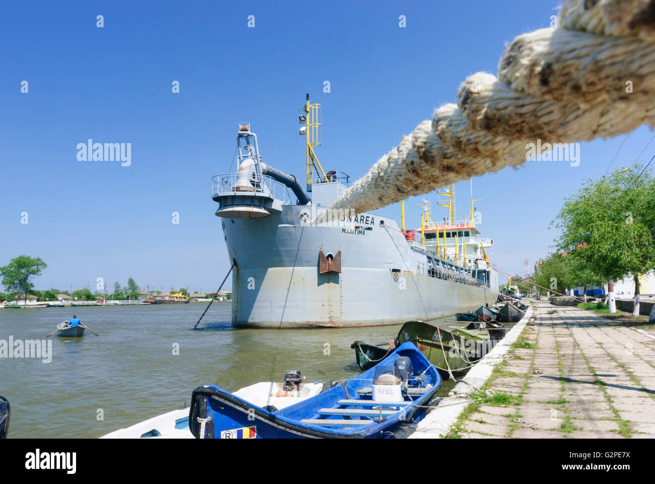 Cargo ship on the banks of Sulina branch of the Danube in the Danube ...