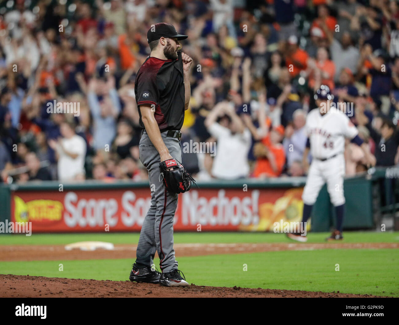 Houston, TX, USA. 1st June, 2016. Arizona Diamondbacks starting pitcher Robbie Ray (38) reacts ...