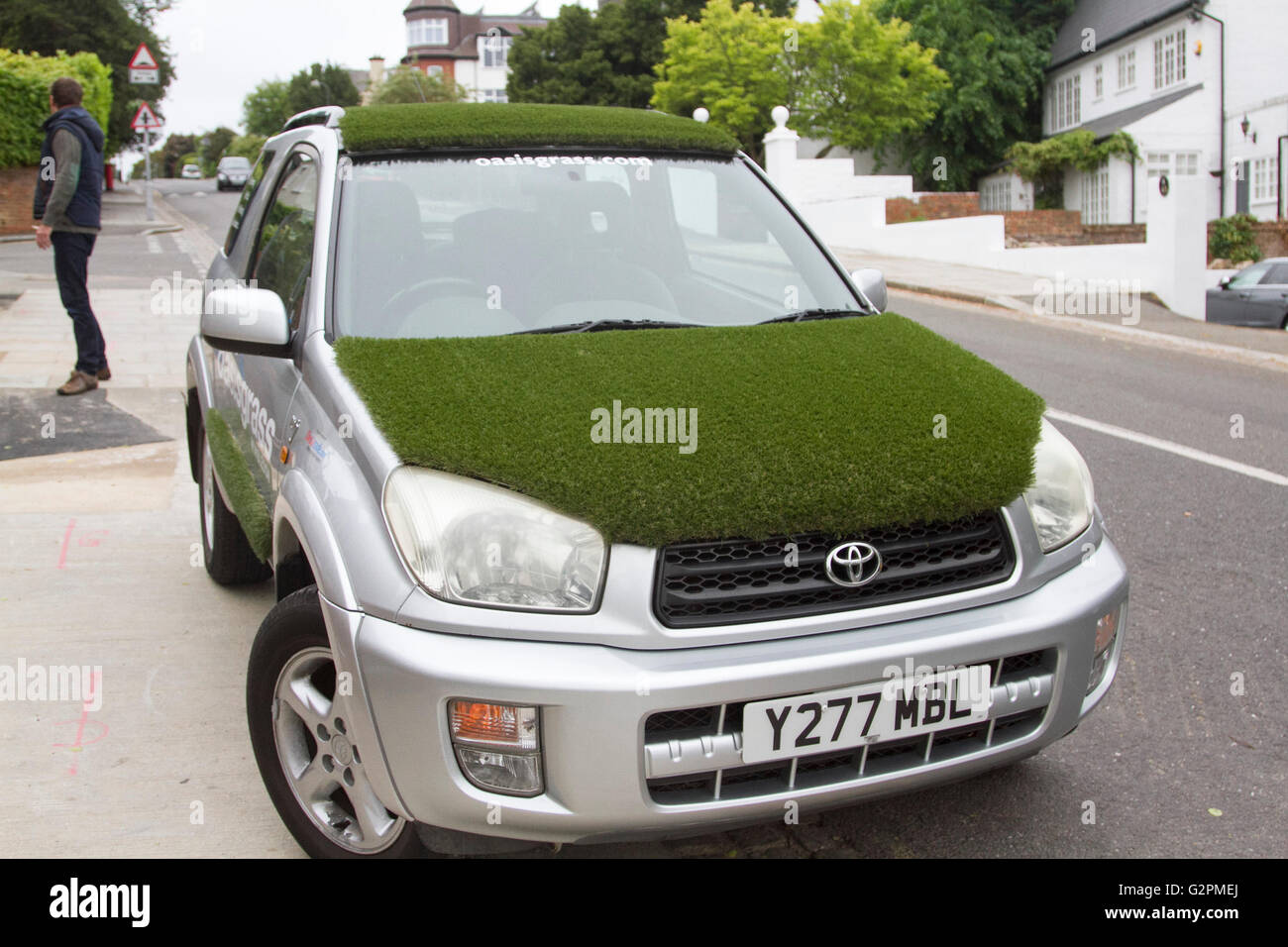 Car covered in artificial grass hi-res stock photography and images - Alamy