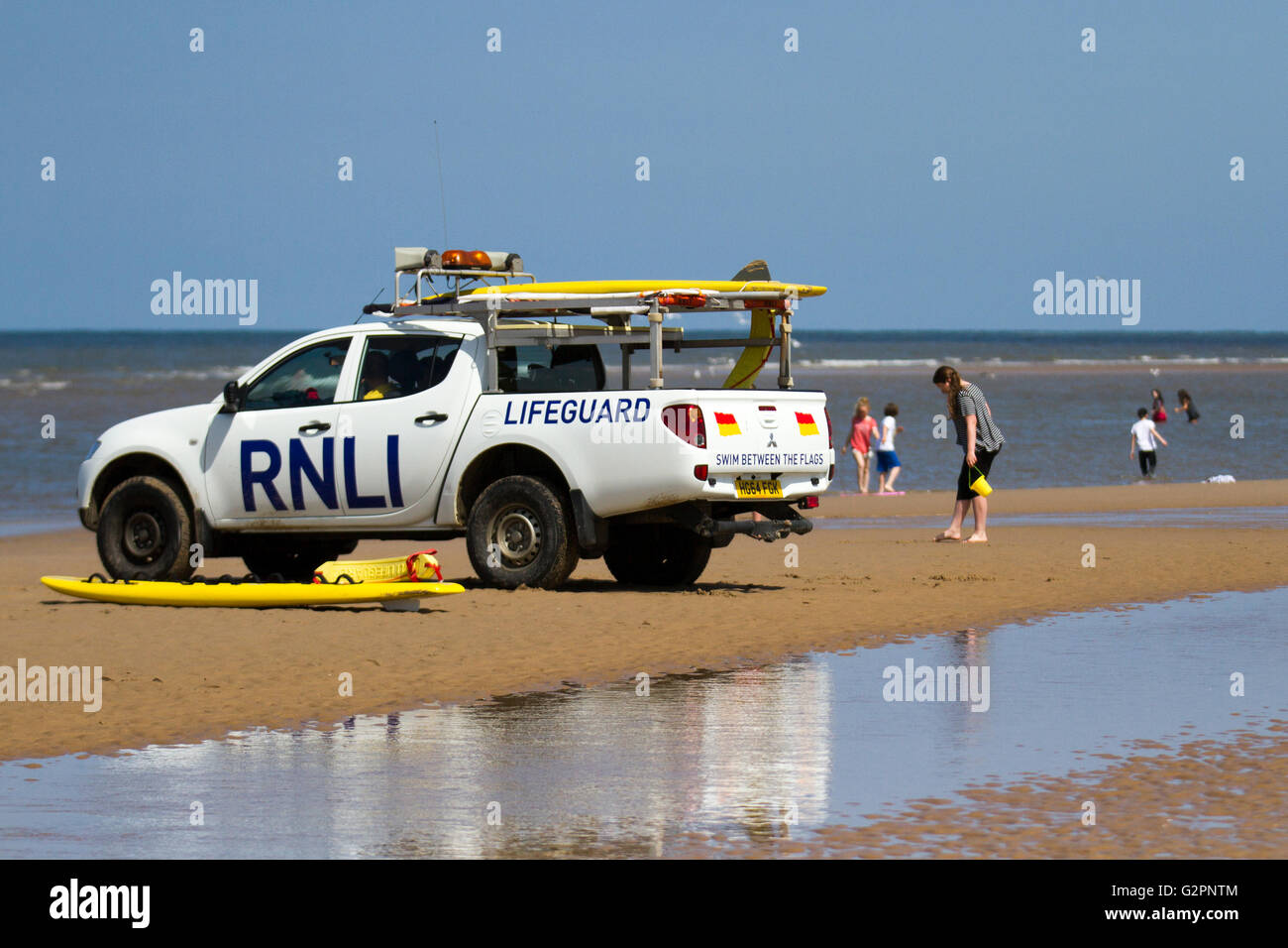 Child running in a puddle hi-res stock photography and images - Alamy