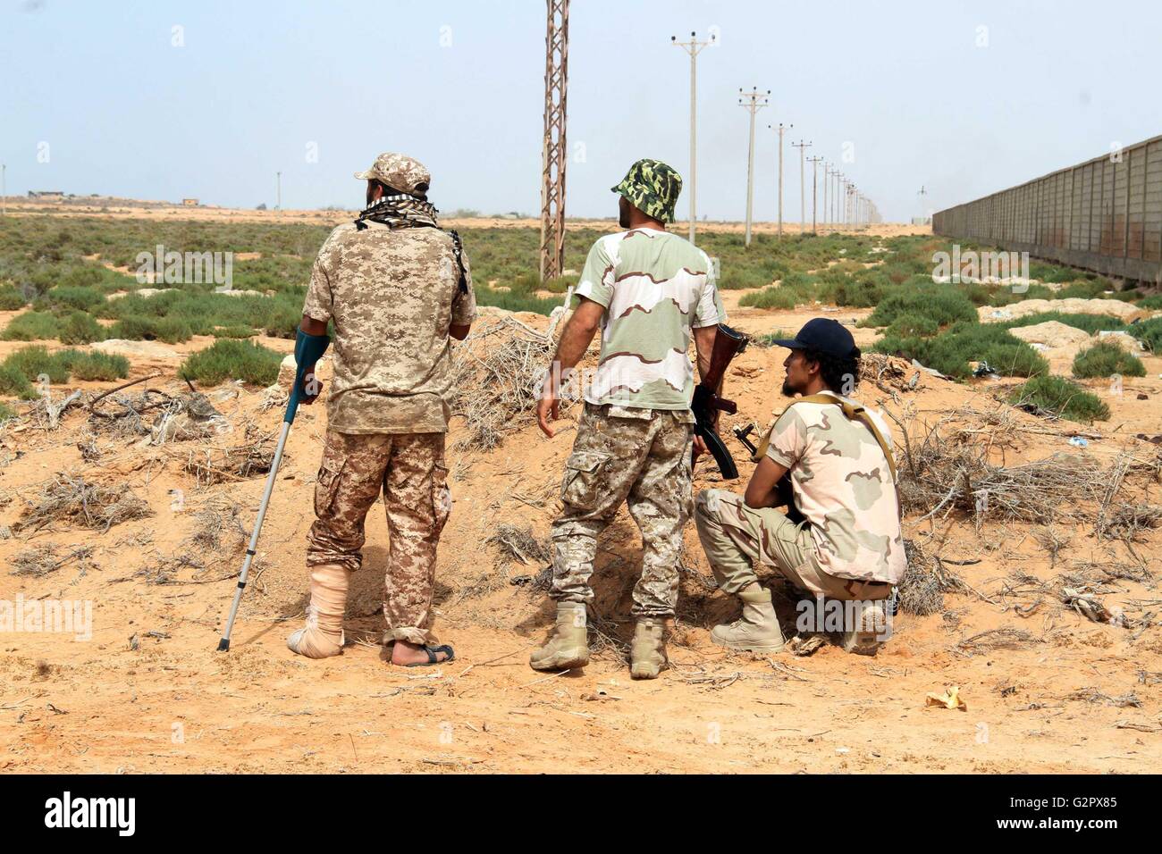 Sirte. 2nd June, 2016. Members of the Libyan army react in the ...