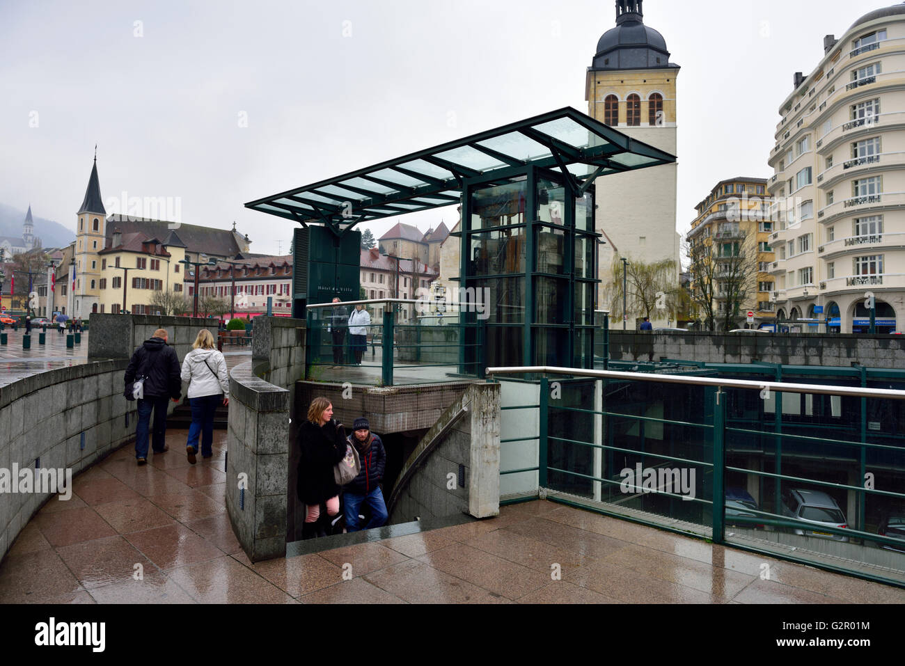 Pedestrian entrance exit from underground car park next to Lake Annecy ...