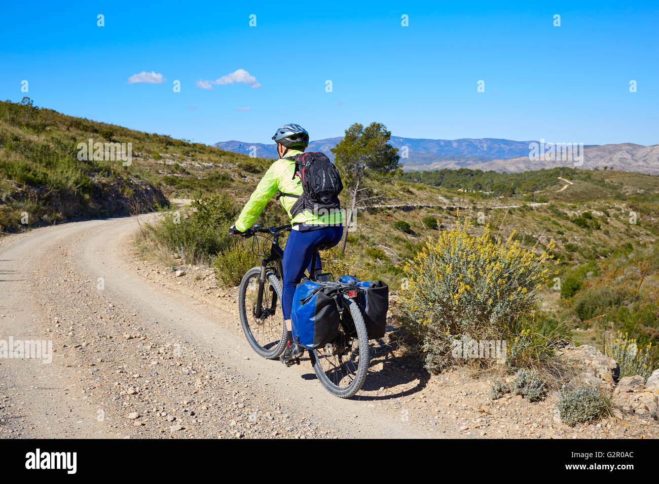 Biker MTB cycle tourism with panniers in Turia Park at pedralba of ...