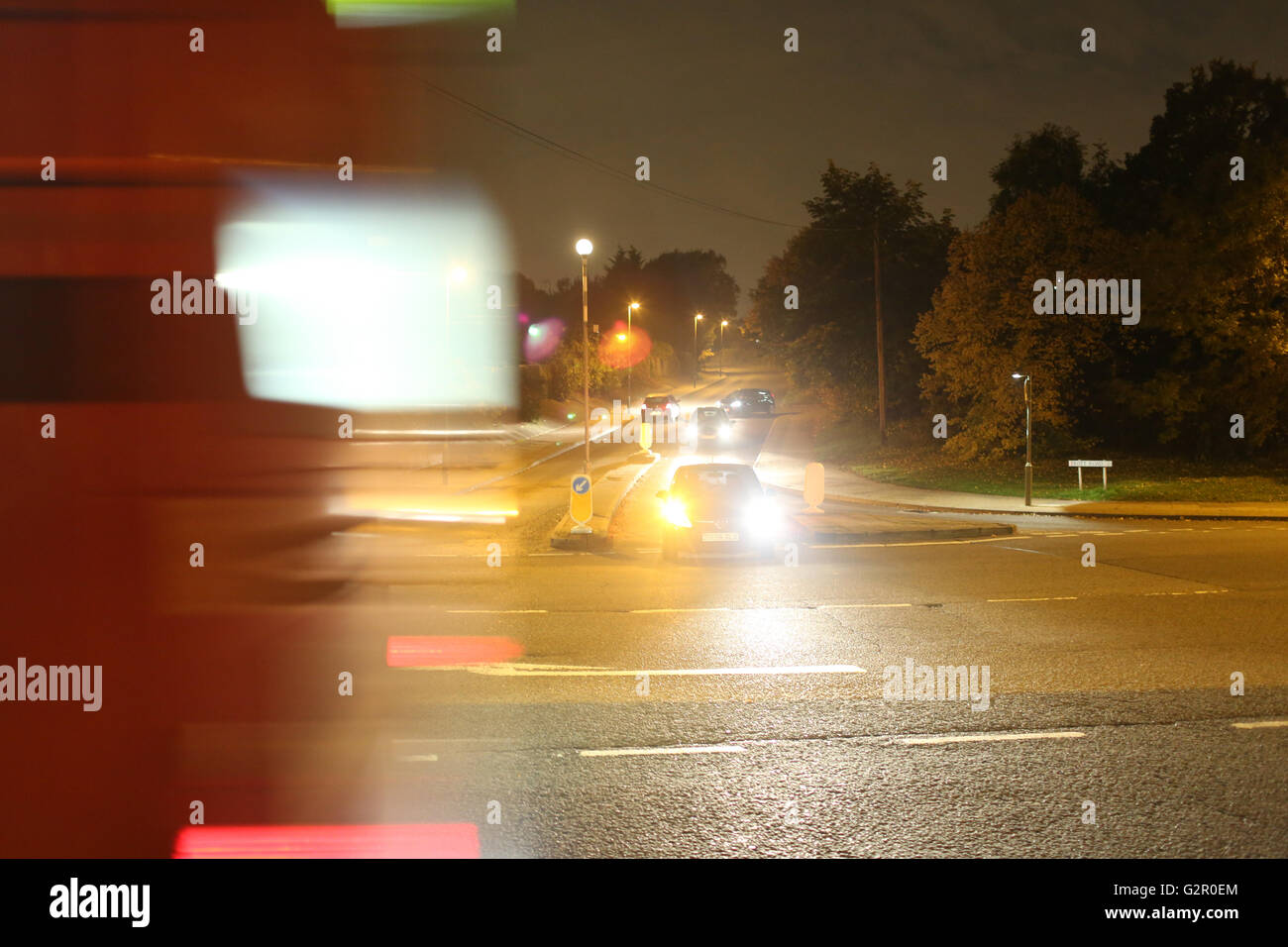 bus, cars at a pedestrian crossing, T junction on Colney Hatch Lane in ...