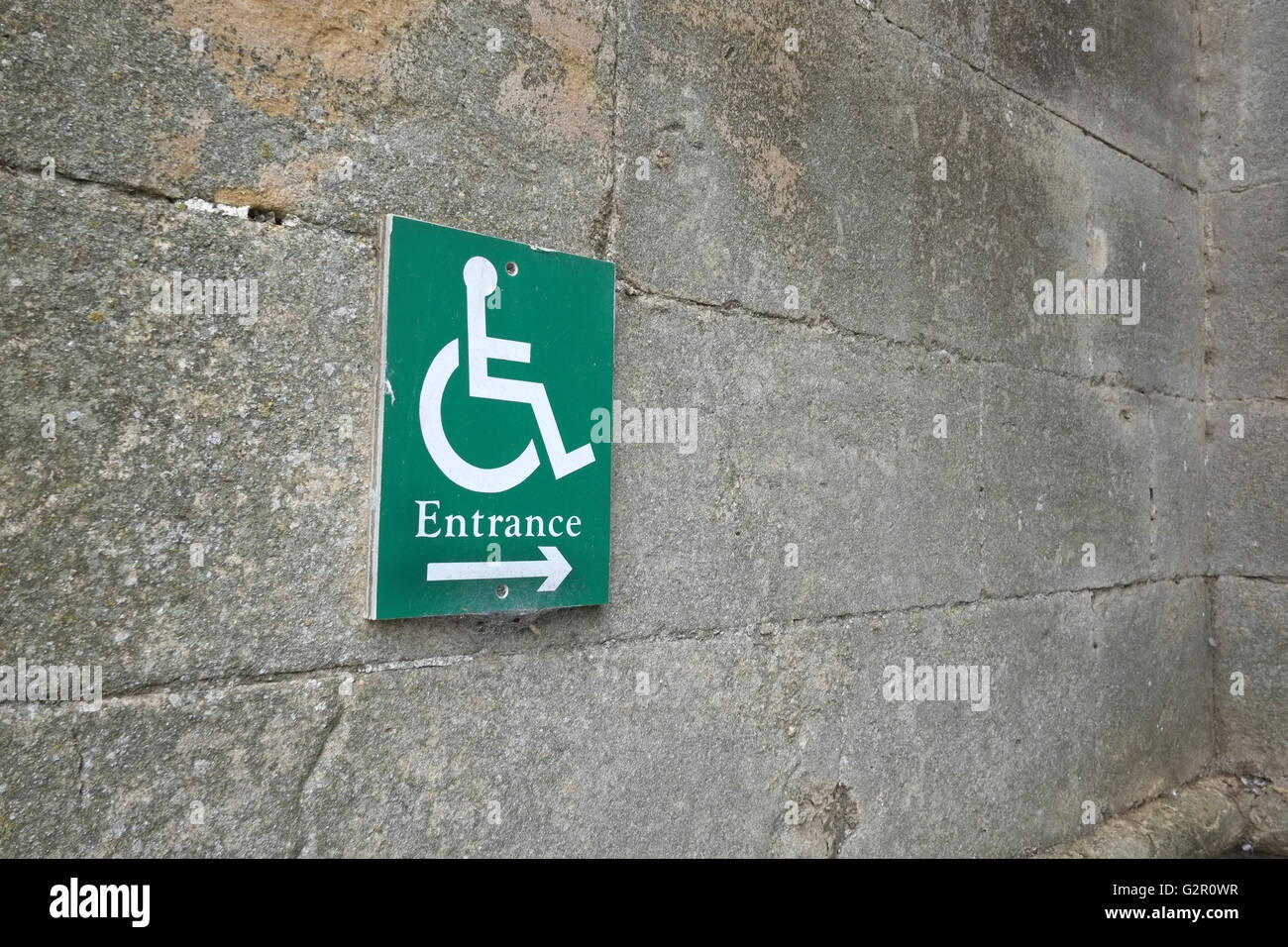 Disabled entrance sign on Wells Cathedral to show the way in. May 2016 ...