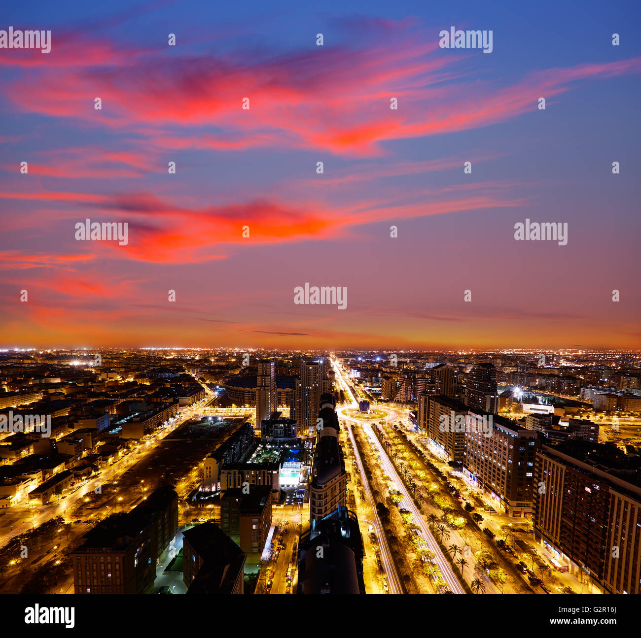 Valencia city skyline at sunset lights aerial in Spain Stock Photo - Alamy