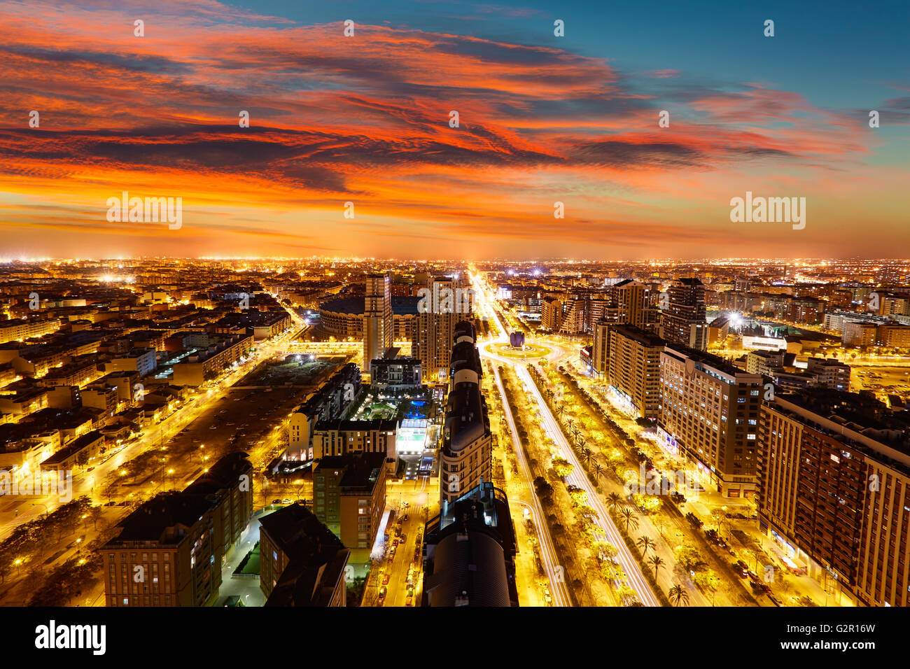 Valencia city skyline at sunset lights aerial in Spain Stock Photo - Alamy