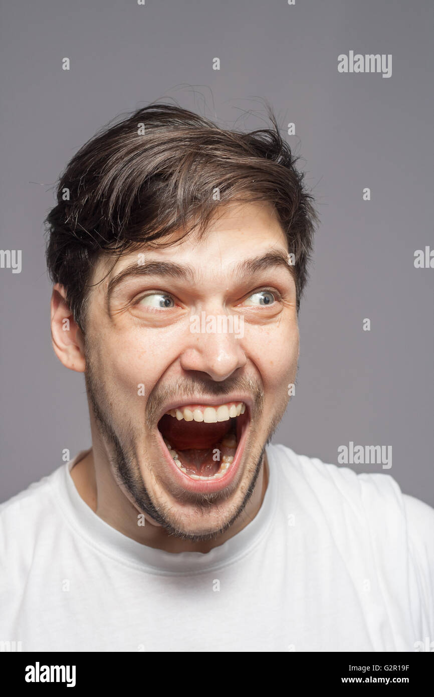 Portrait man, looking sideways, shocked, amazed, terrified Stock Photo ...