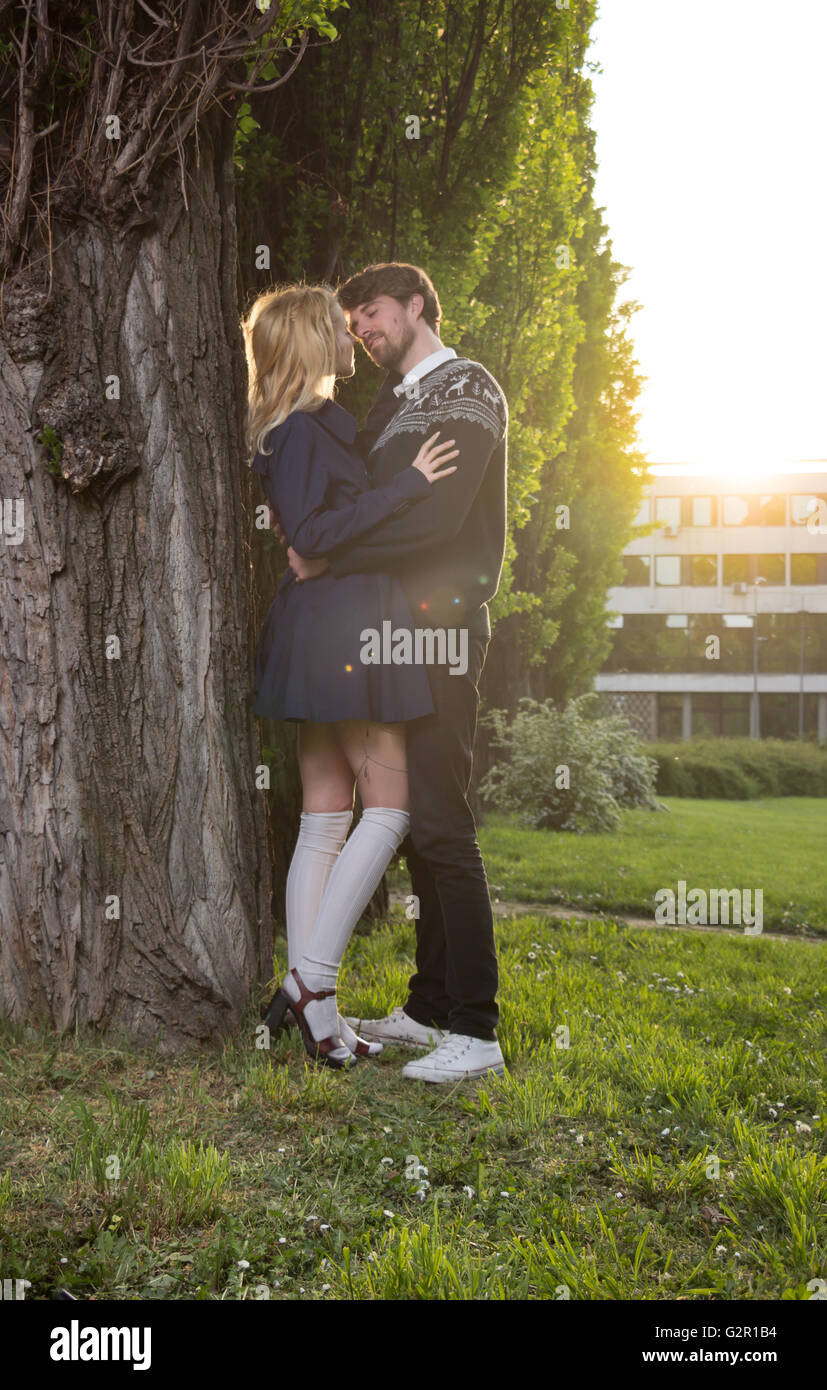 Romance couple hug arms. Lens flare Stock Photo - Alamy