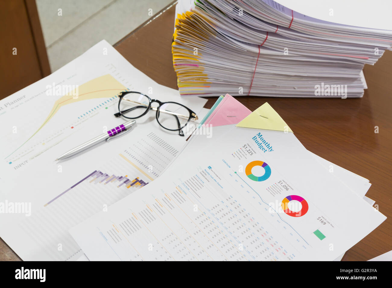 Analysis chart and paperwork on office table Stock Photo - Alamy