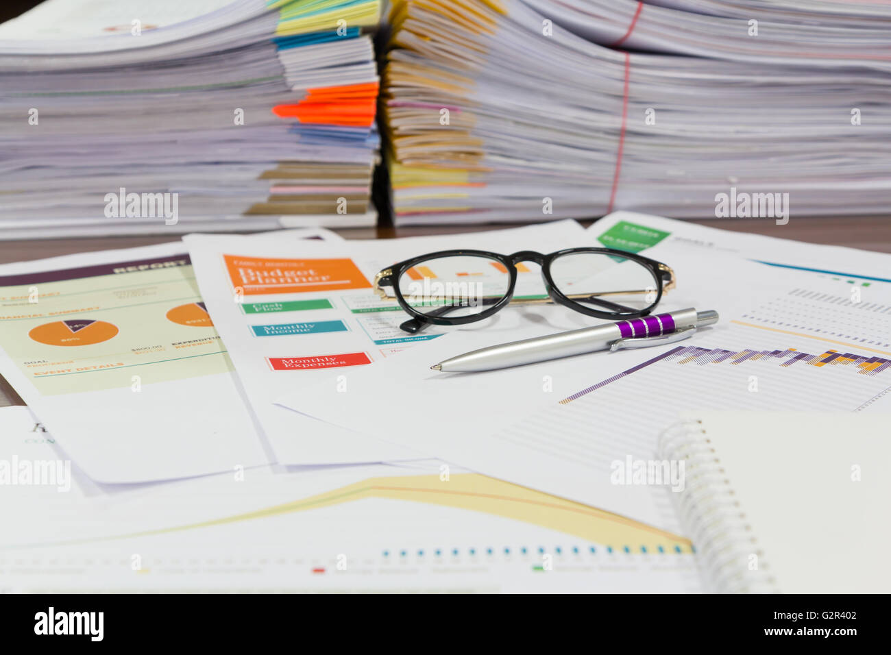 Analysis chart and paperwork on office table Stock Photo - Alamy
