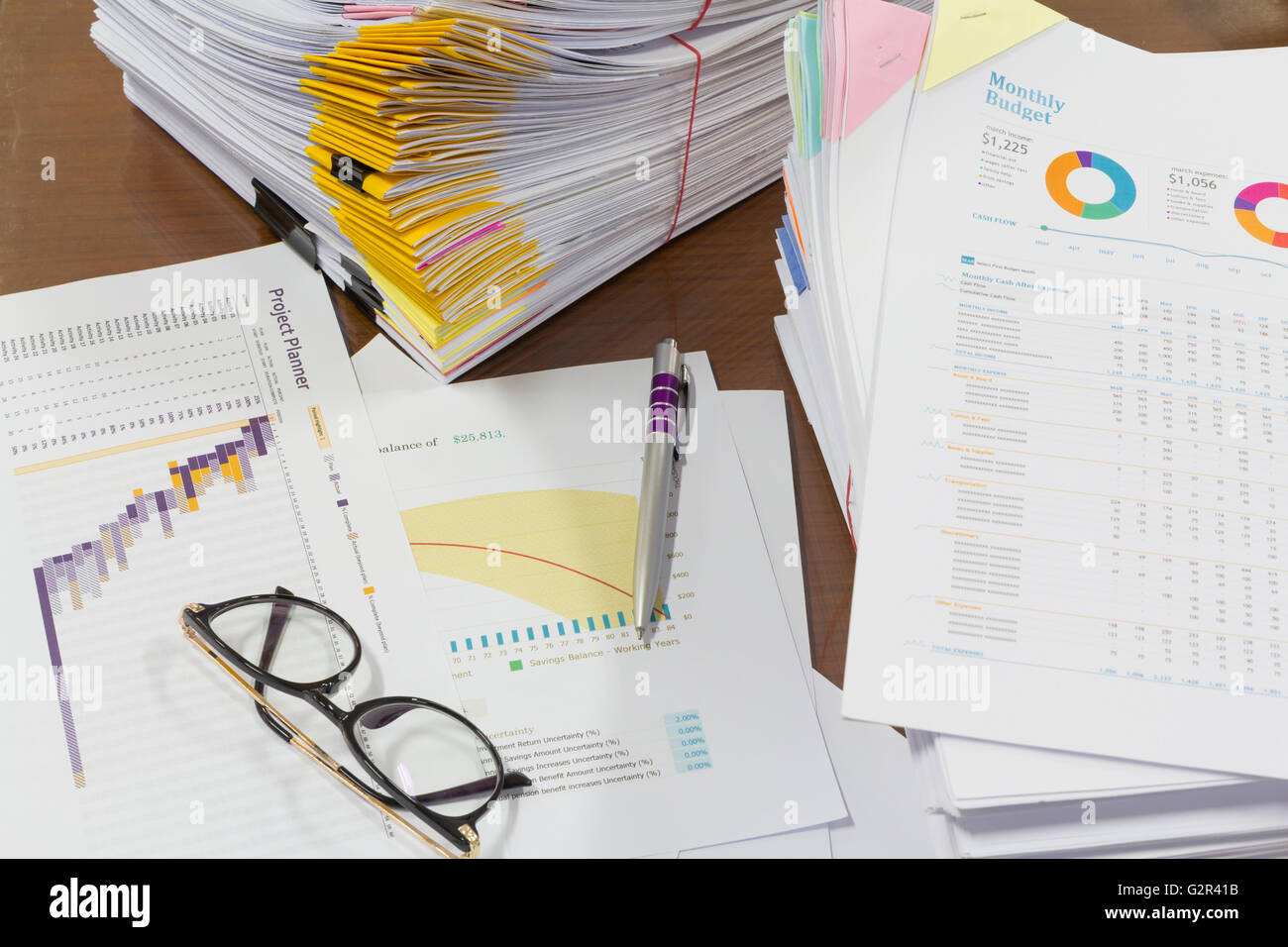 Analysis chart and paperwork on office table Stock Photo - Alamy