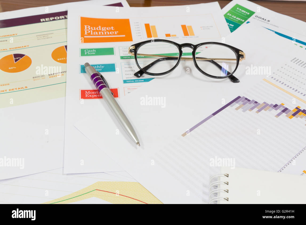 Analysis chart and paperwork on office table Stock Photo - Alamy