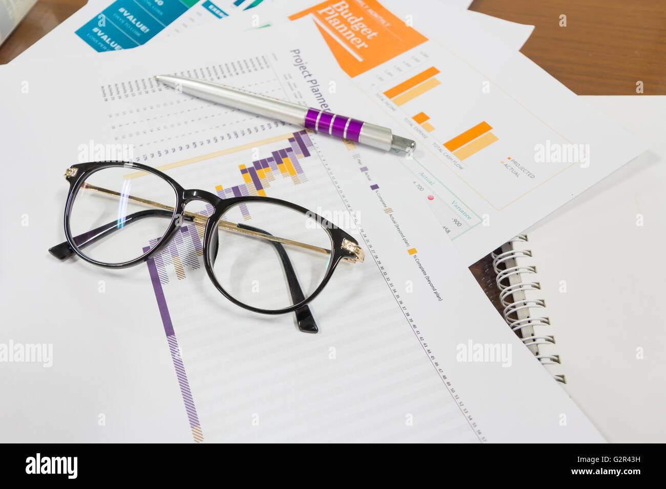 Analysis chart and paperwork on office table Stock Photo - Alamy